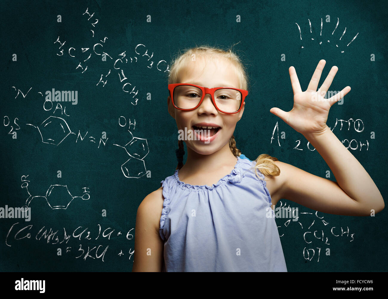 Genius girl in red glasses near blackboard with formulas Stock Photo ...