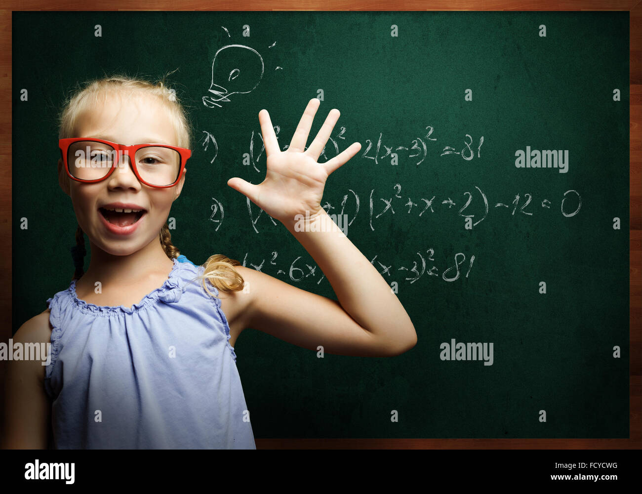 Genius girl in red glasses near blackboard with formulas Stock Photo ...