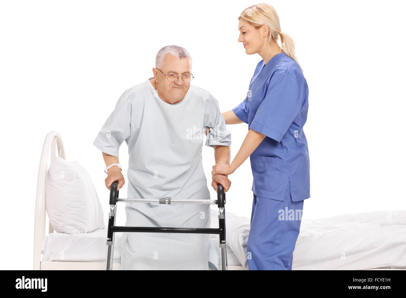 Young female nurse assisting a senior patient with a walker isolated on ...