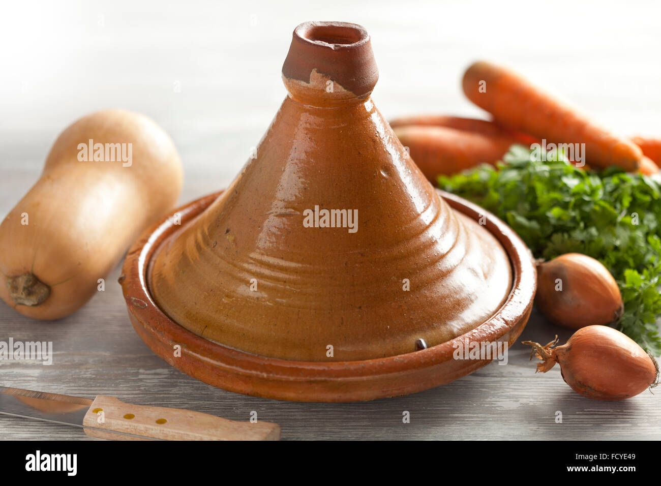 Moroccan traditional tagine with raw vegetables Stock Photo - Alamy