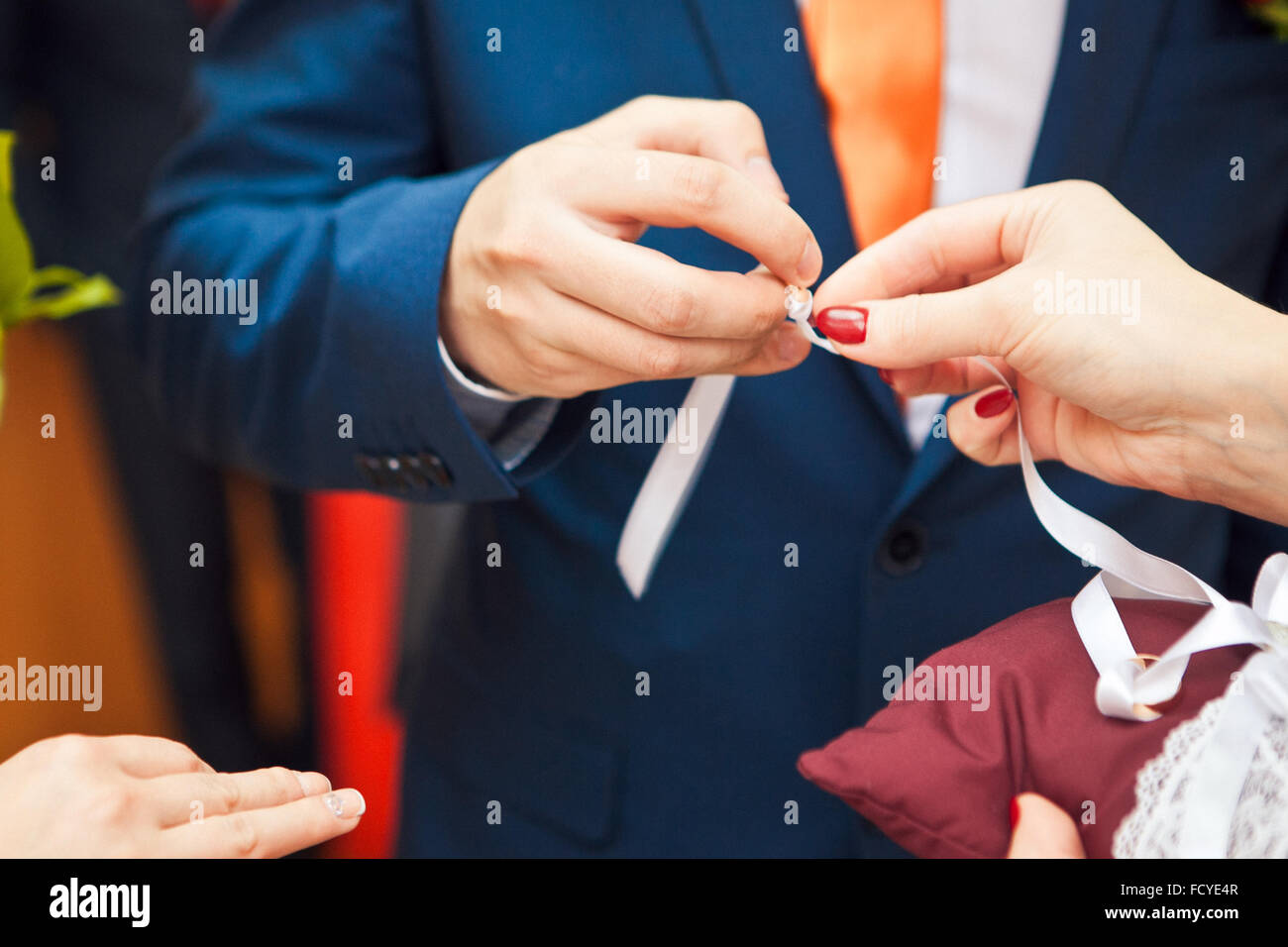 Bride finger groom putting ring hi-res stock photography and images - Alamy