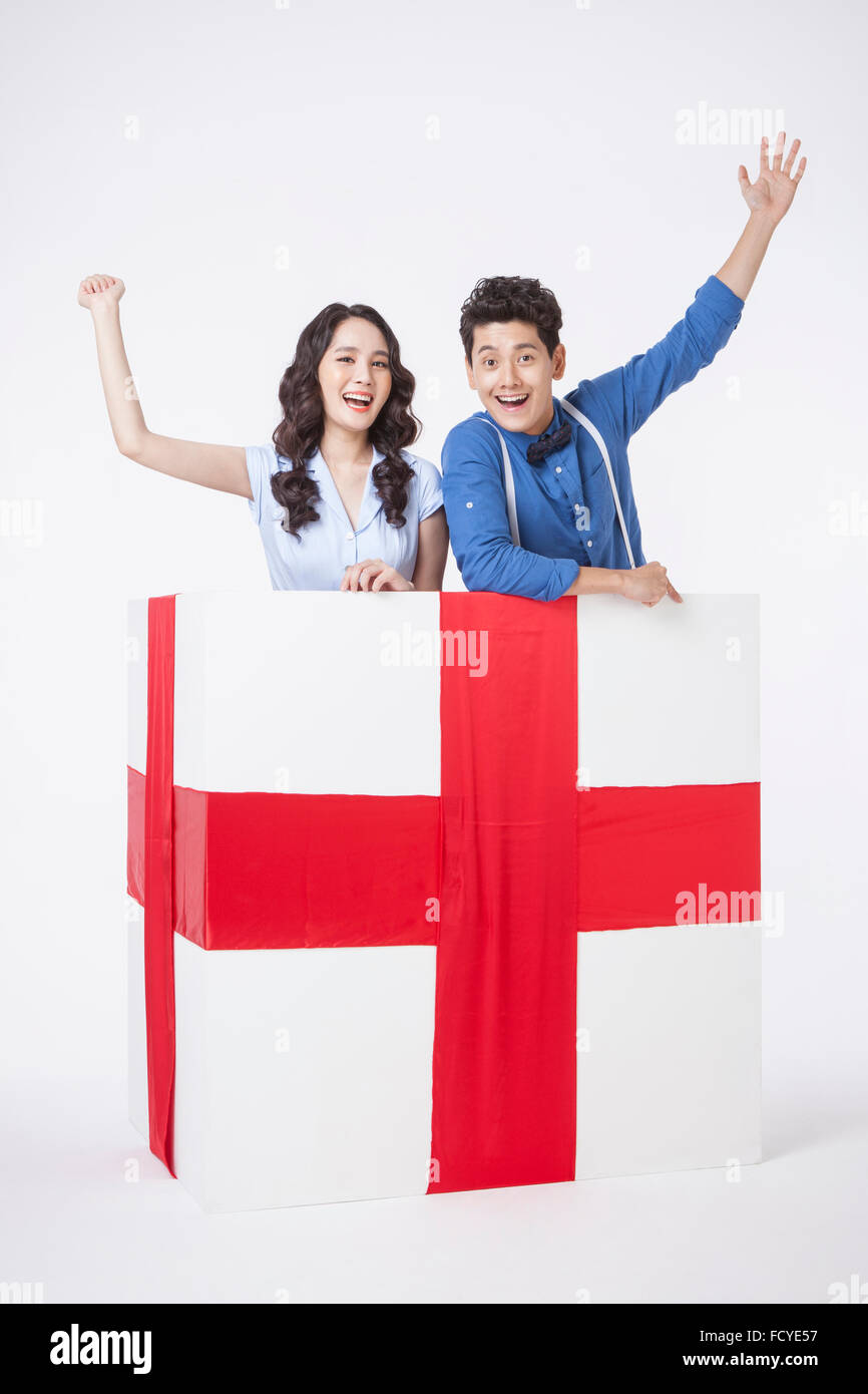 Hand putting gift hi-res stock photography and images - Alamy