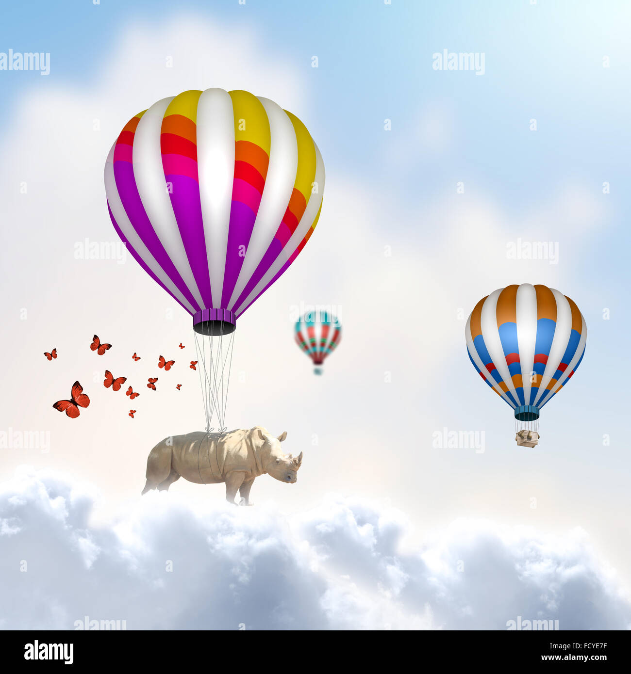 Rhino flying high in sky on colorful aerostat Stock Photo - Alamy
