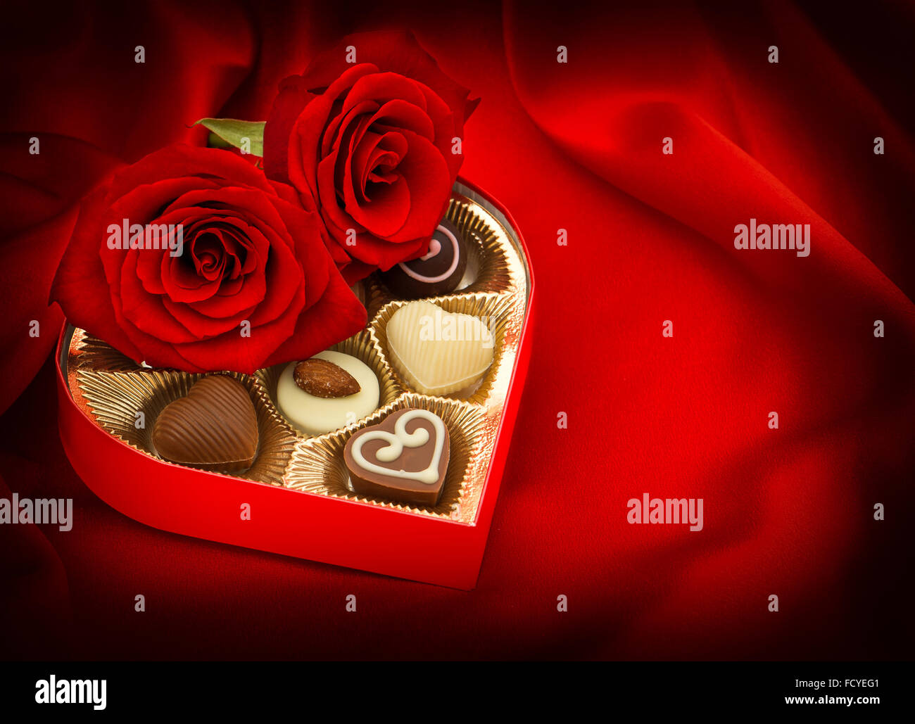 Red roses and chocolate candy in gift box. Heart. Love. Vintage style ...