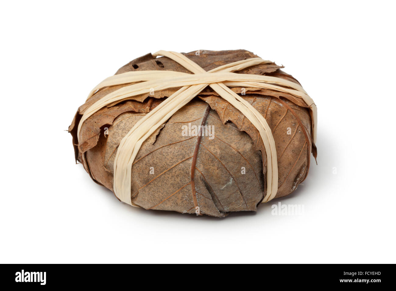 French Banon cheese in chestnut leaves on white background Stock Photo ...