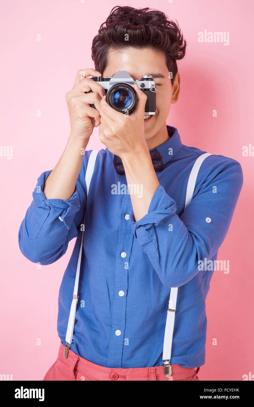 Man retro camera in hi-res stock photography and images - Alamy