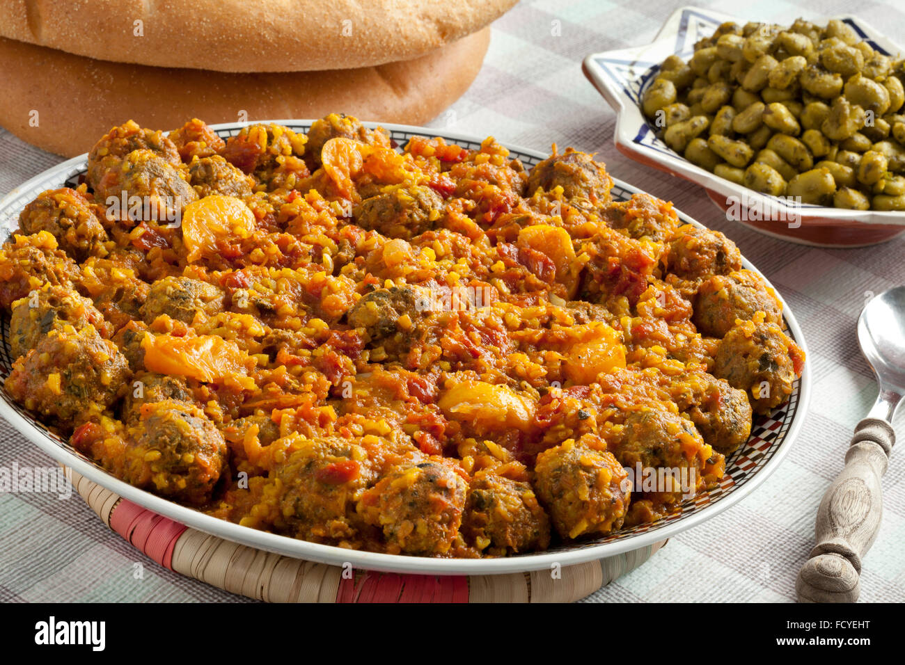 Traditional Moroccan dish with kefta sardines and broad beans Stock ...