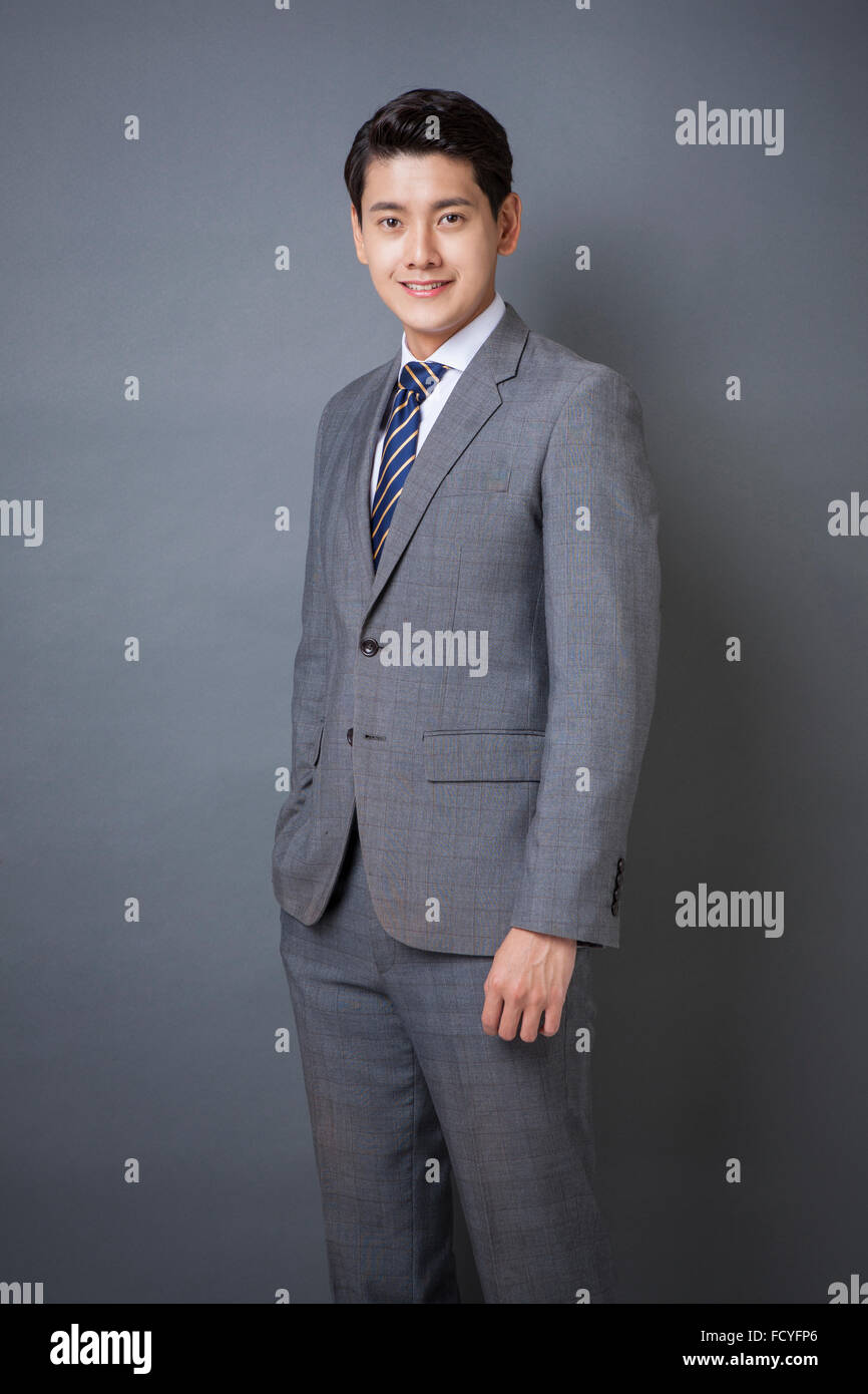 Man in suit and tie in retro style staring forward with a smile Stock ...