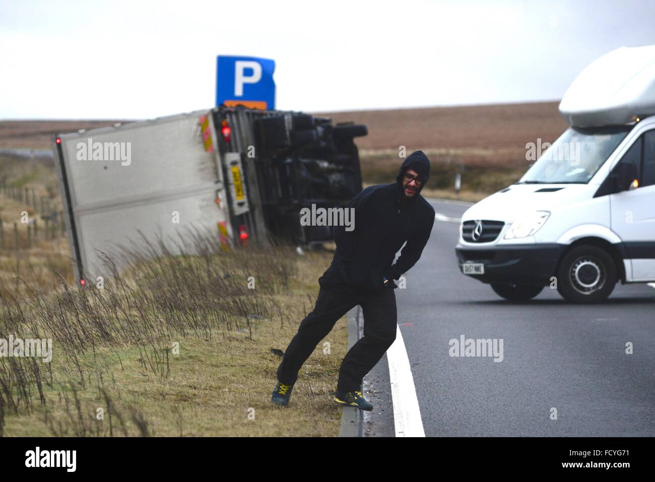 Lorry blown over in strong hi-res stock photography and images - Alamy