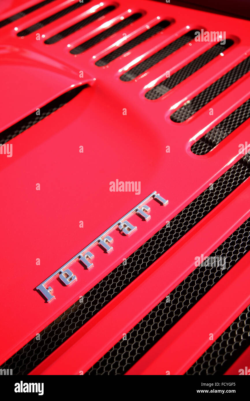 Engine cover and badge of red Ferrari sportscar Stock Photo - Alamy