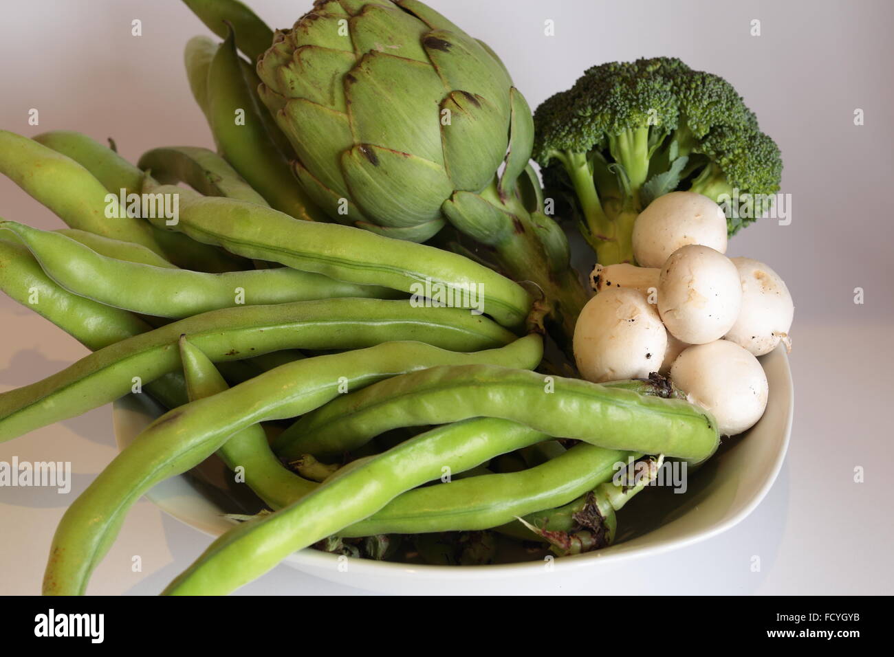 Several vegetables on a plate Stock Photo - Alamy