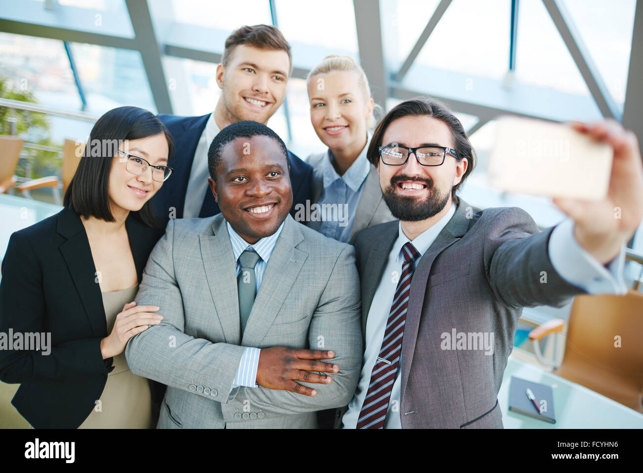 Successful managers making their selfie in office Stock Photo - Alamy