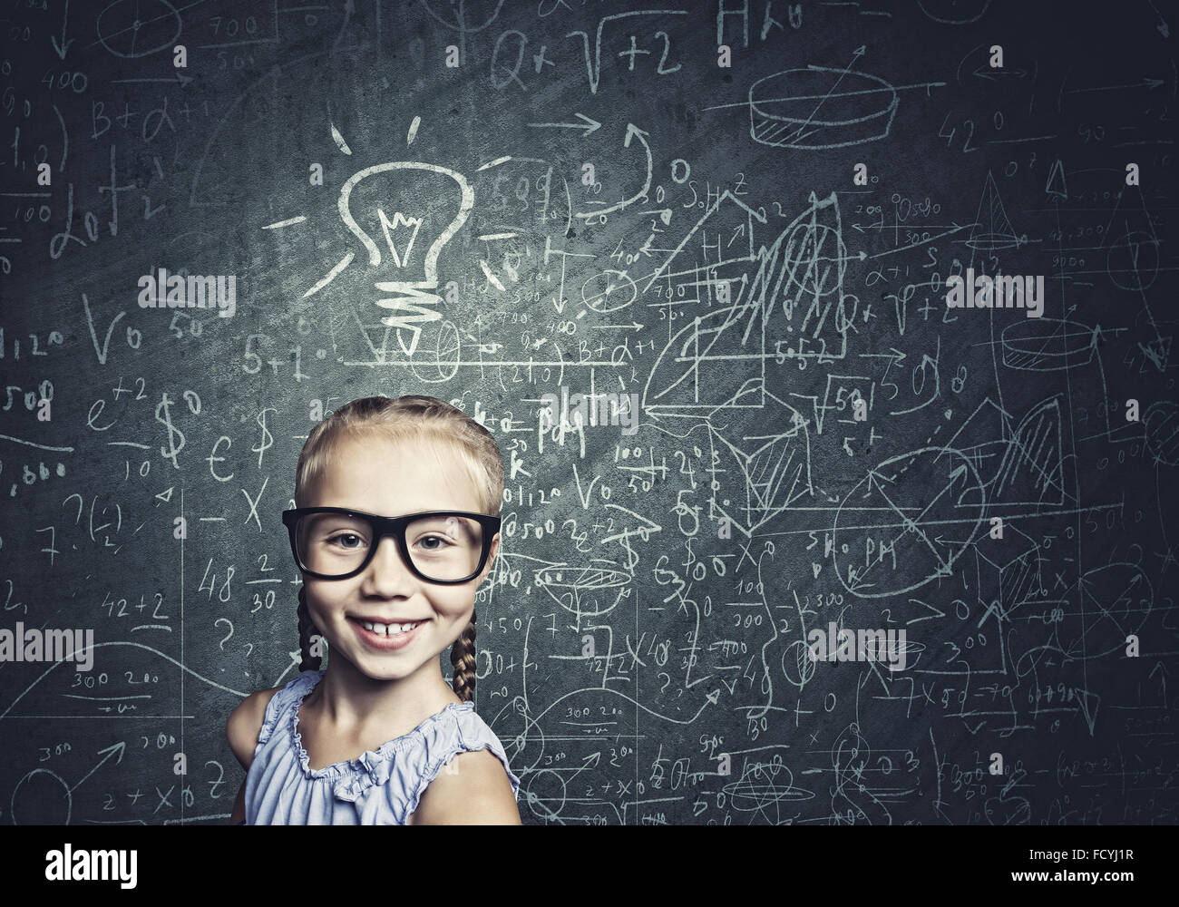 Genius girl in red glasses near blackboard with formulas Stock Photo ...