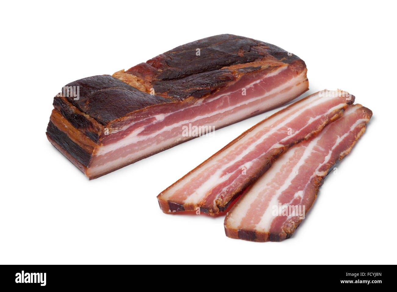German Schwarzwalder seitenspeck and slices on white background Stock ...