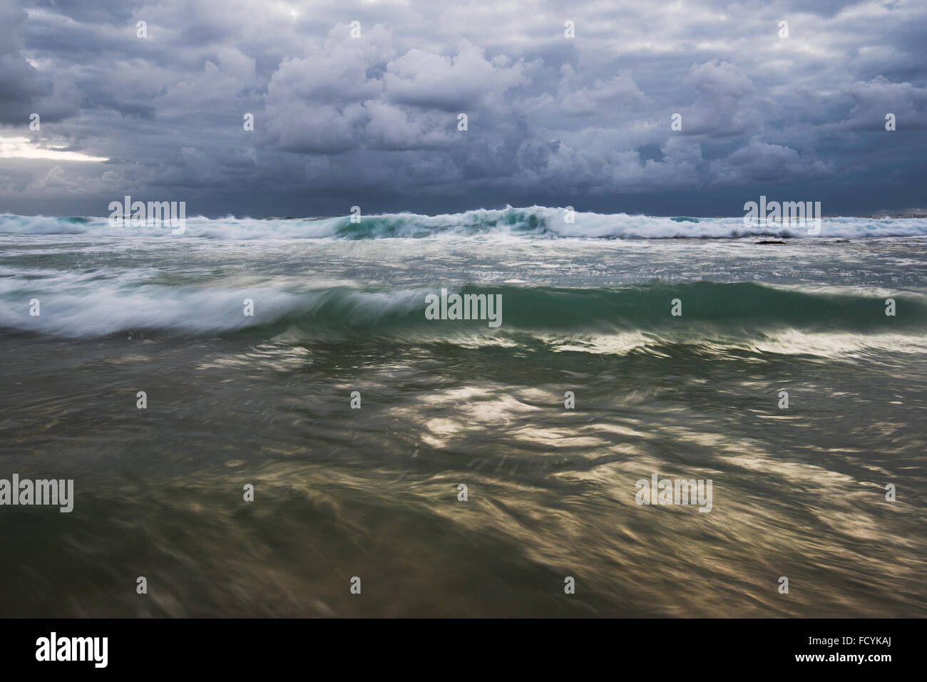 Colours and texture of water, shape and flow of waves and stormy sky in ...