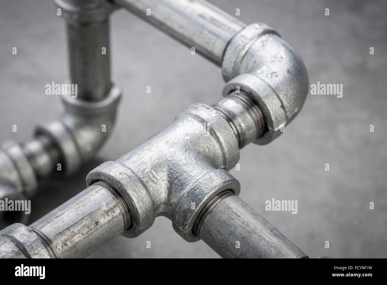 Close-up of pipes connected Stock Photo - Alamy