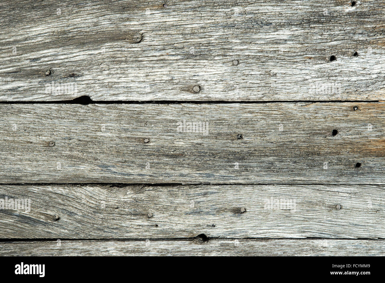 Old weathered wooden garden seat texture Stock Photo - Alamy