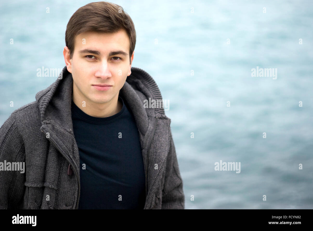 Young man smiling outdoors, portrait Stock Photo - Alamy