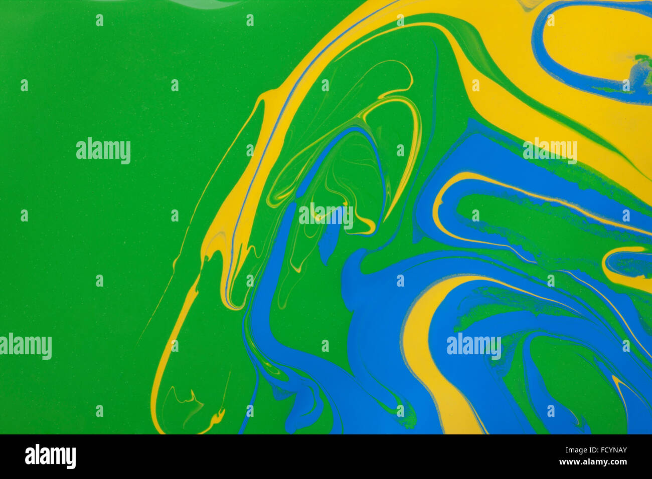 Marbling style of paint with green, yellow, and blue color Stock Photo ...