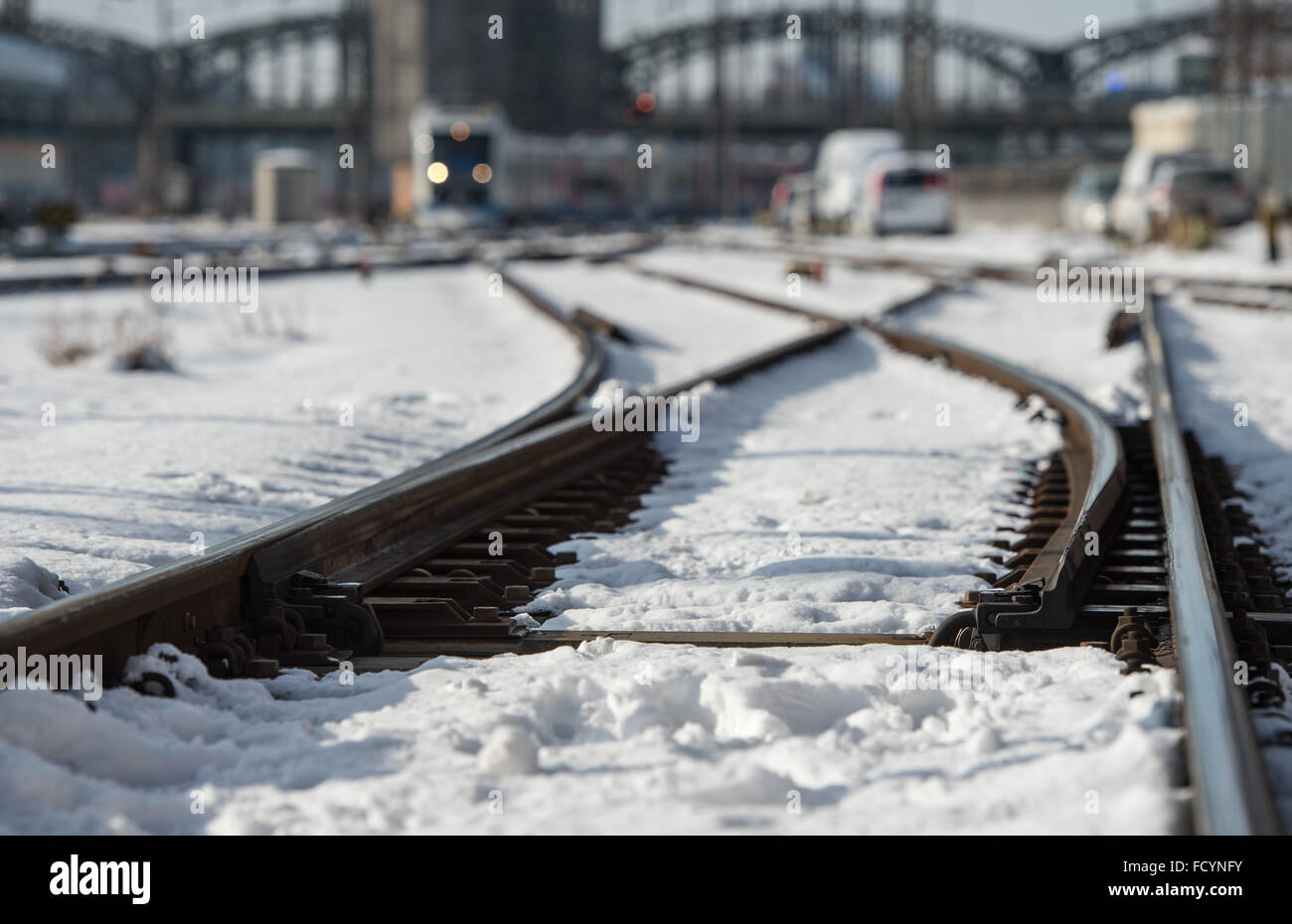 A snow-covered railway switch equipped with a heater pictured at the ...
