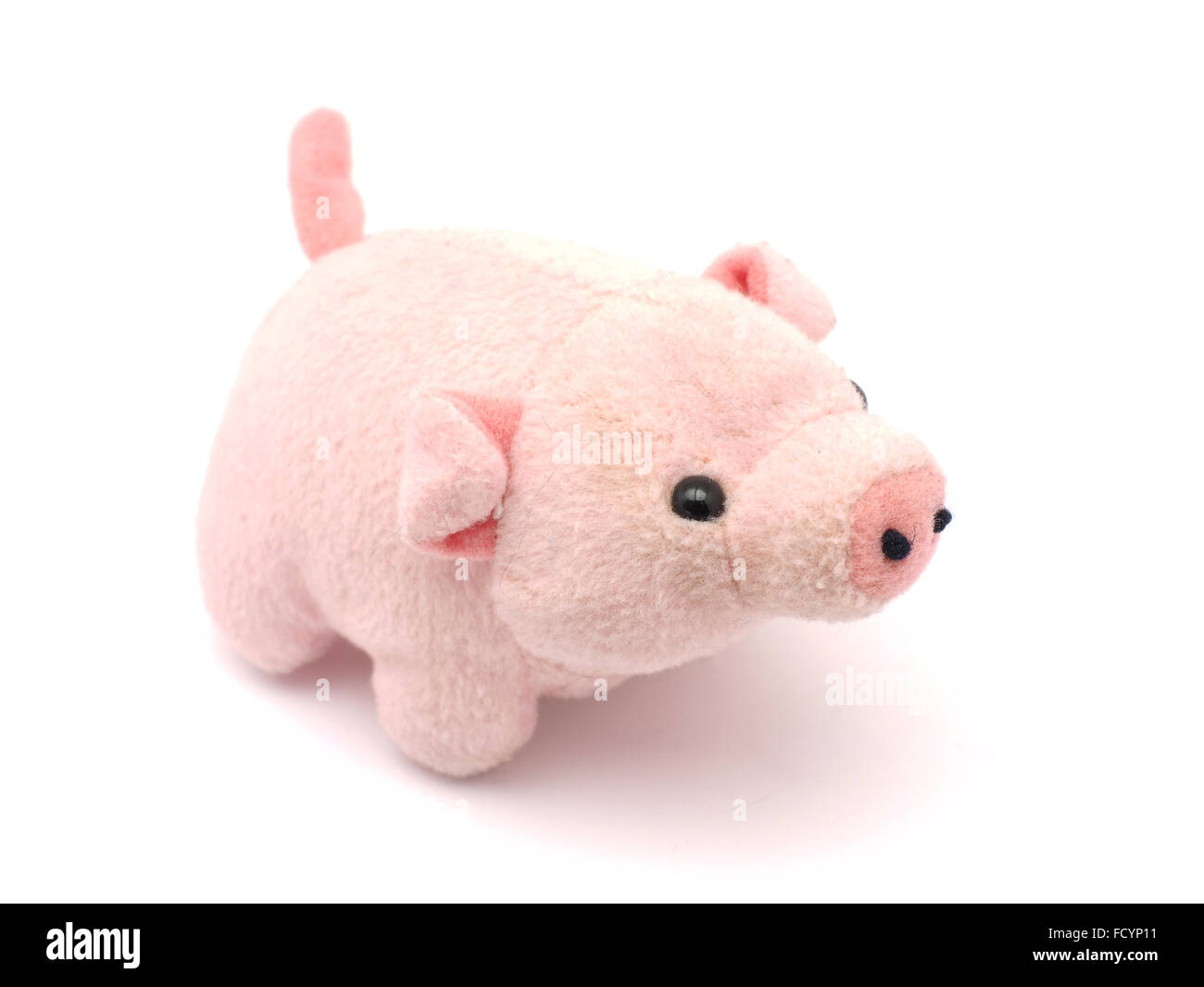 soft toy pig on a white background Stock Photo - Alamy