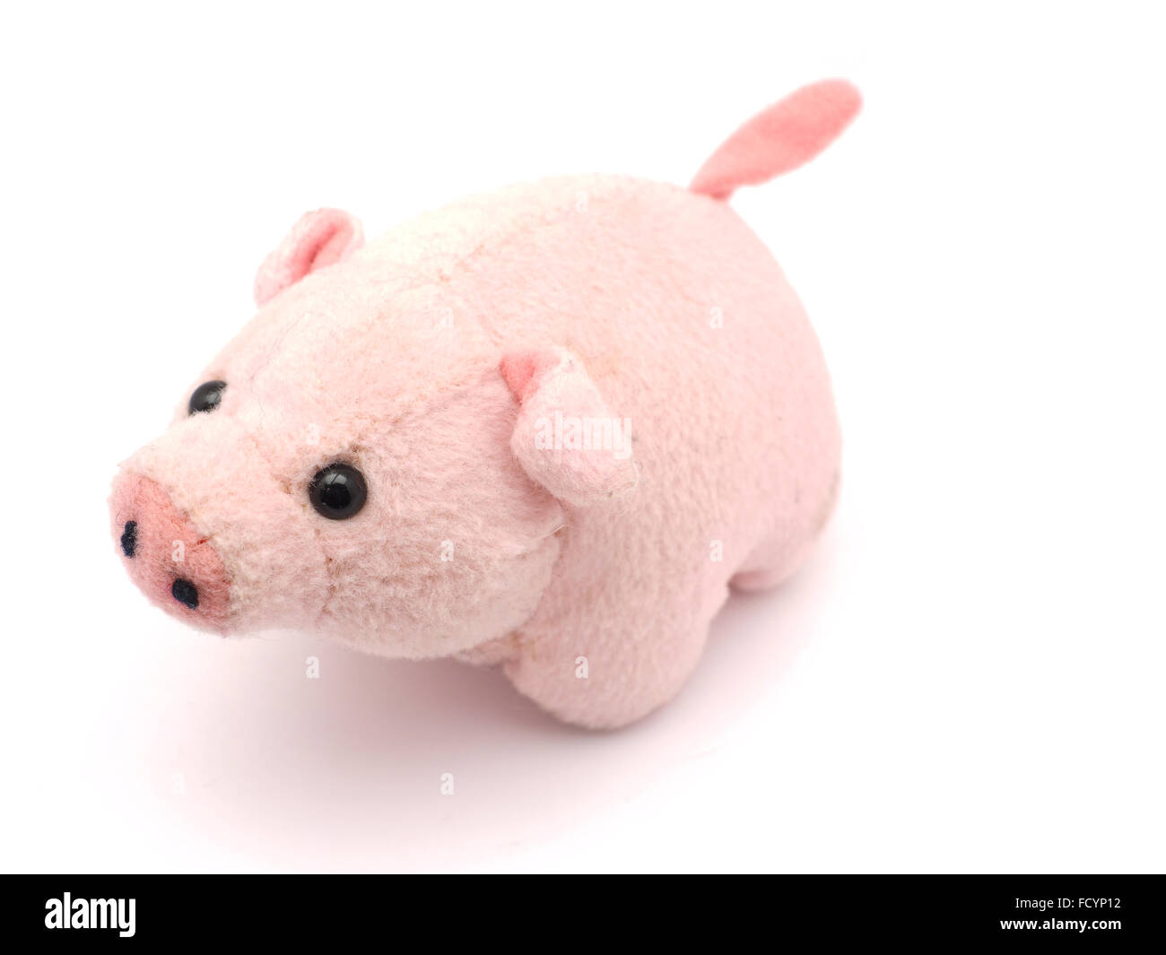 soft toy pig on a white background Stock Photo - Alamy