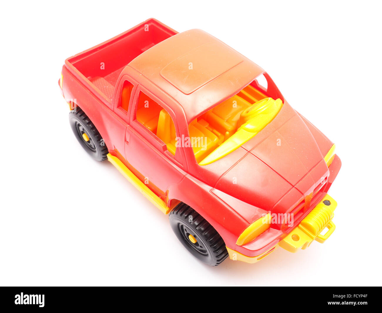 red toy car on a white background Stock Photo - Alamy
