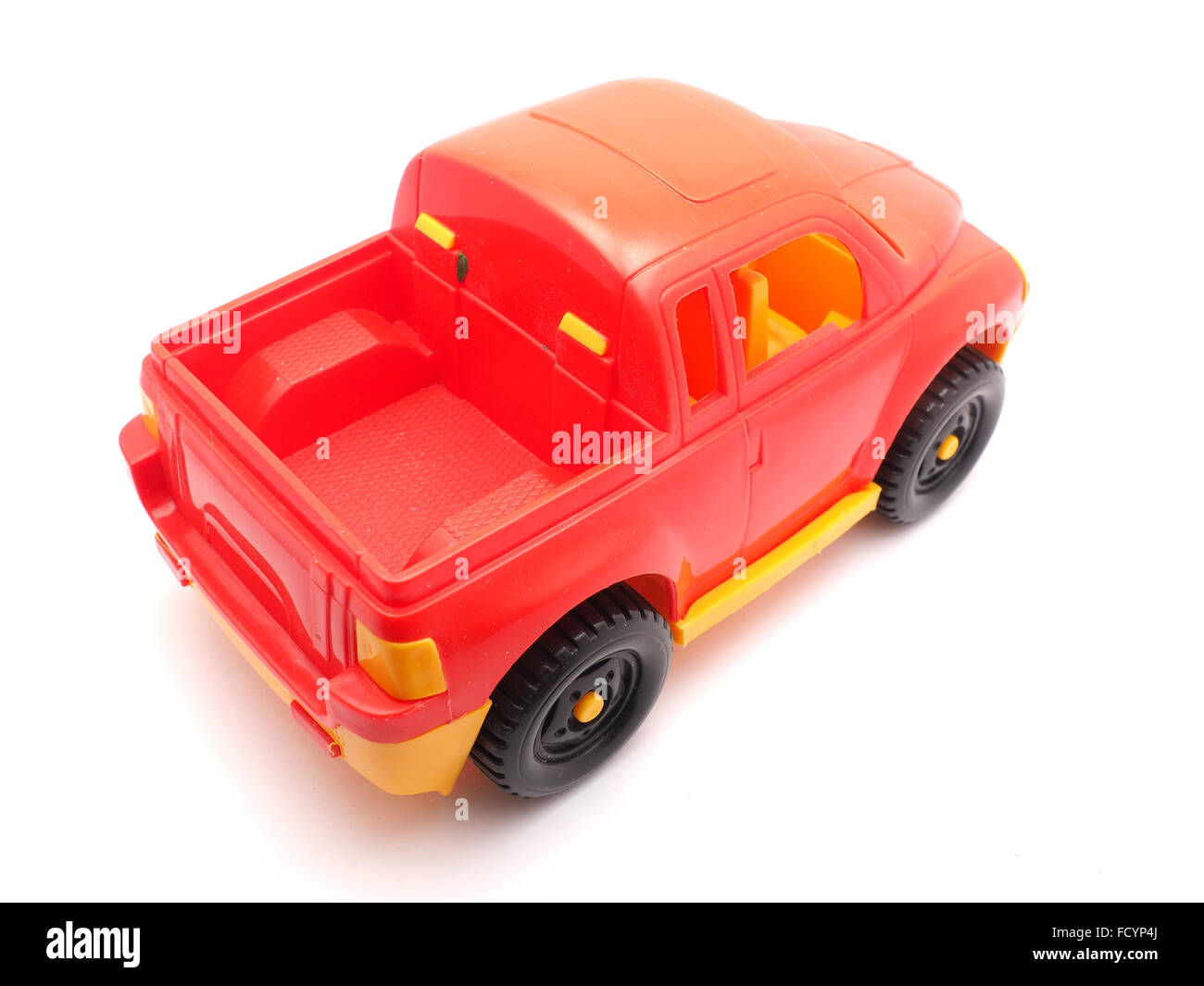 red toy car on a white background Stock Photo - Alamy