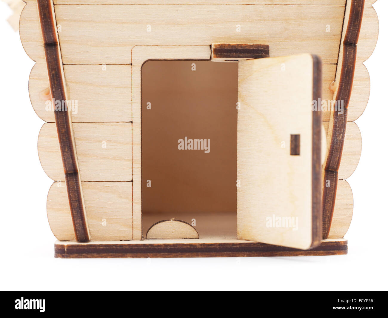 Wooden toy house on a white background Stock Photo - Alamy
