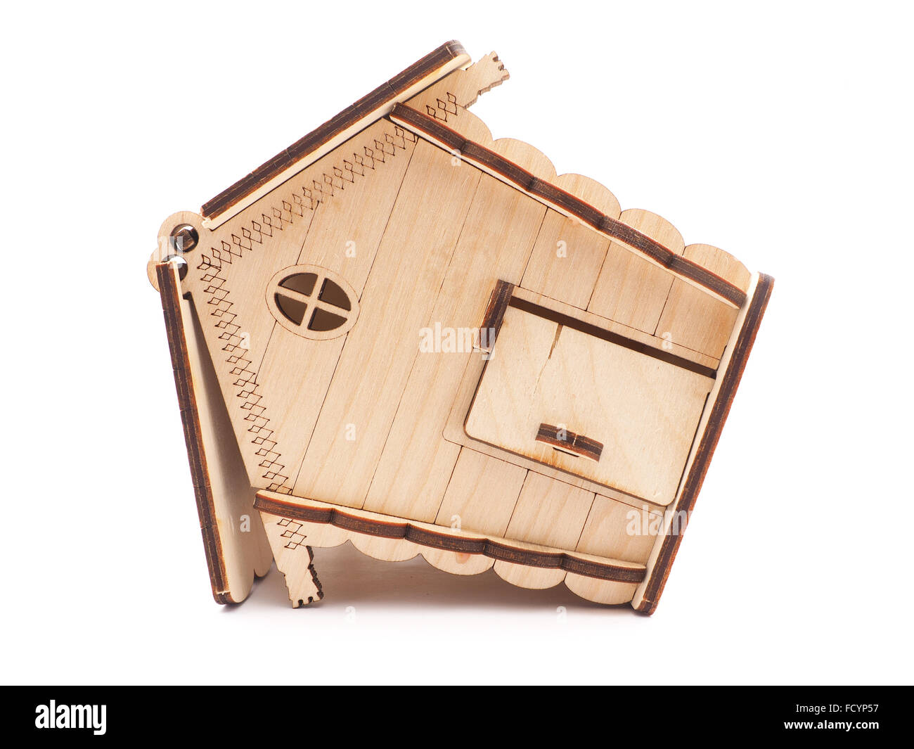Wooden toy house on a white background Stock Photo - Alamy