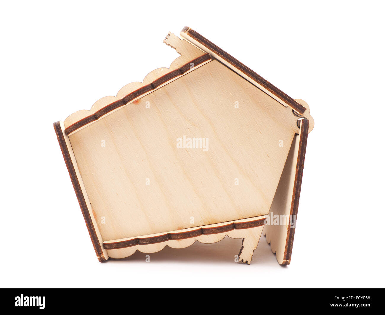 Wooden toy house on a white background Stock Photo - Alamy