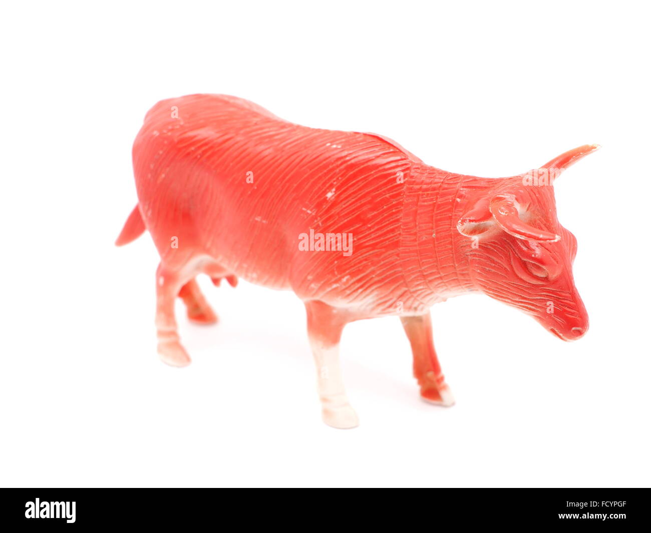 Red Bull toy on a white background Stock Photo - Alamy