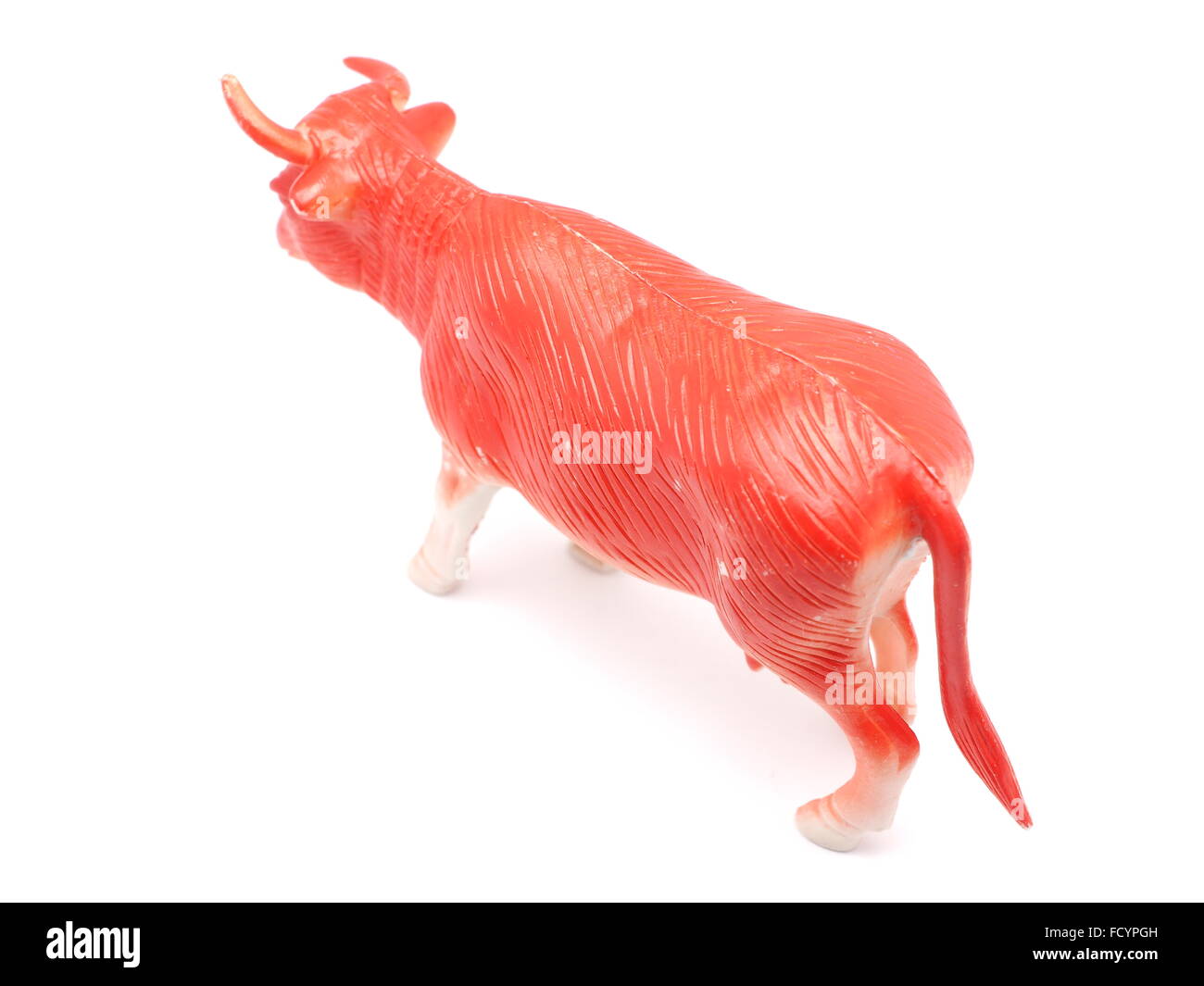 Red Bull toy on a white background Stock Photo - Alamy