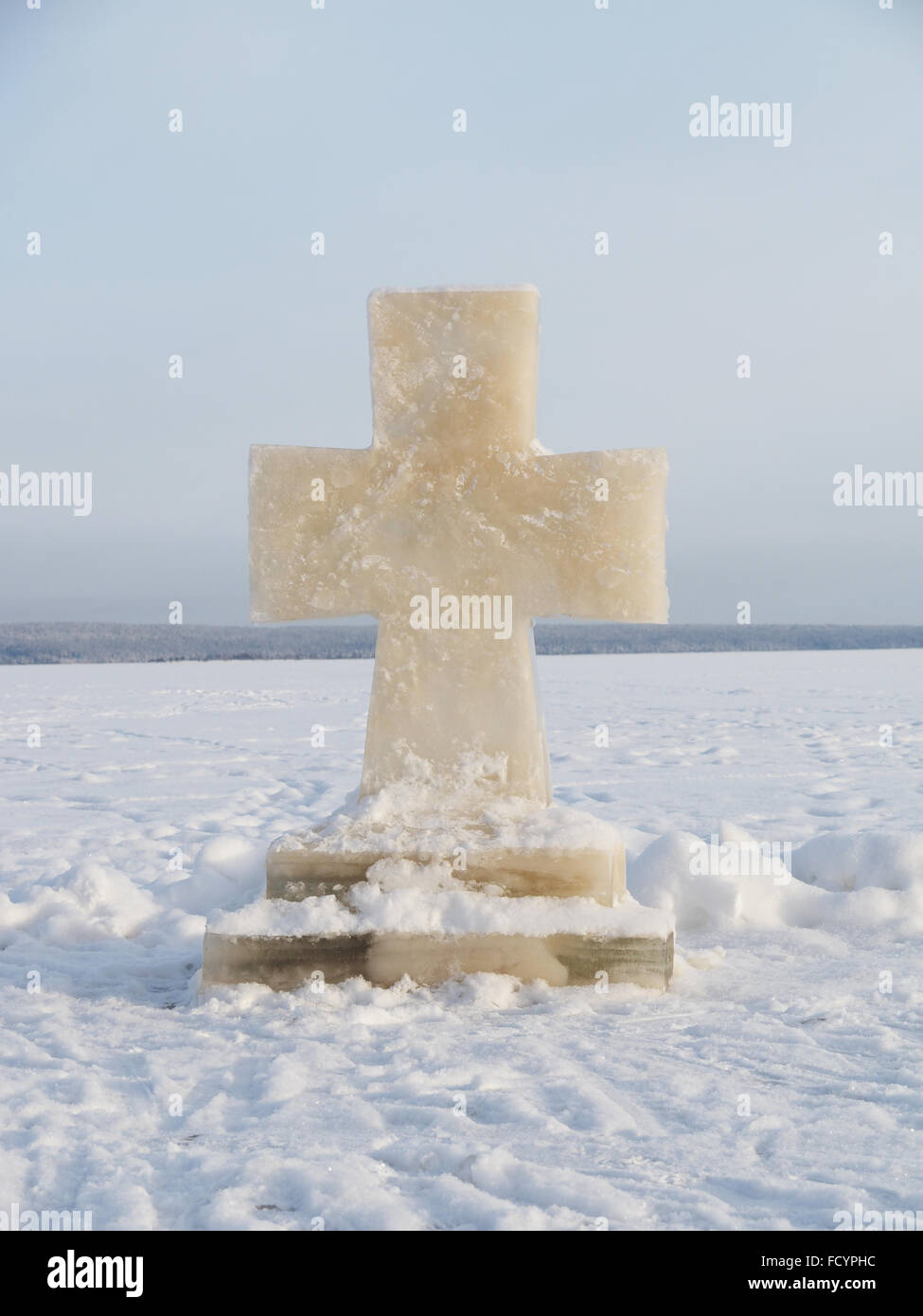 Cross in the winter on the lake Stock Photo - Alamy
