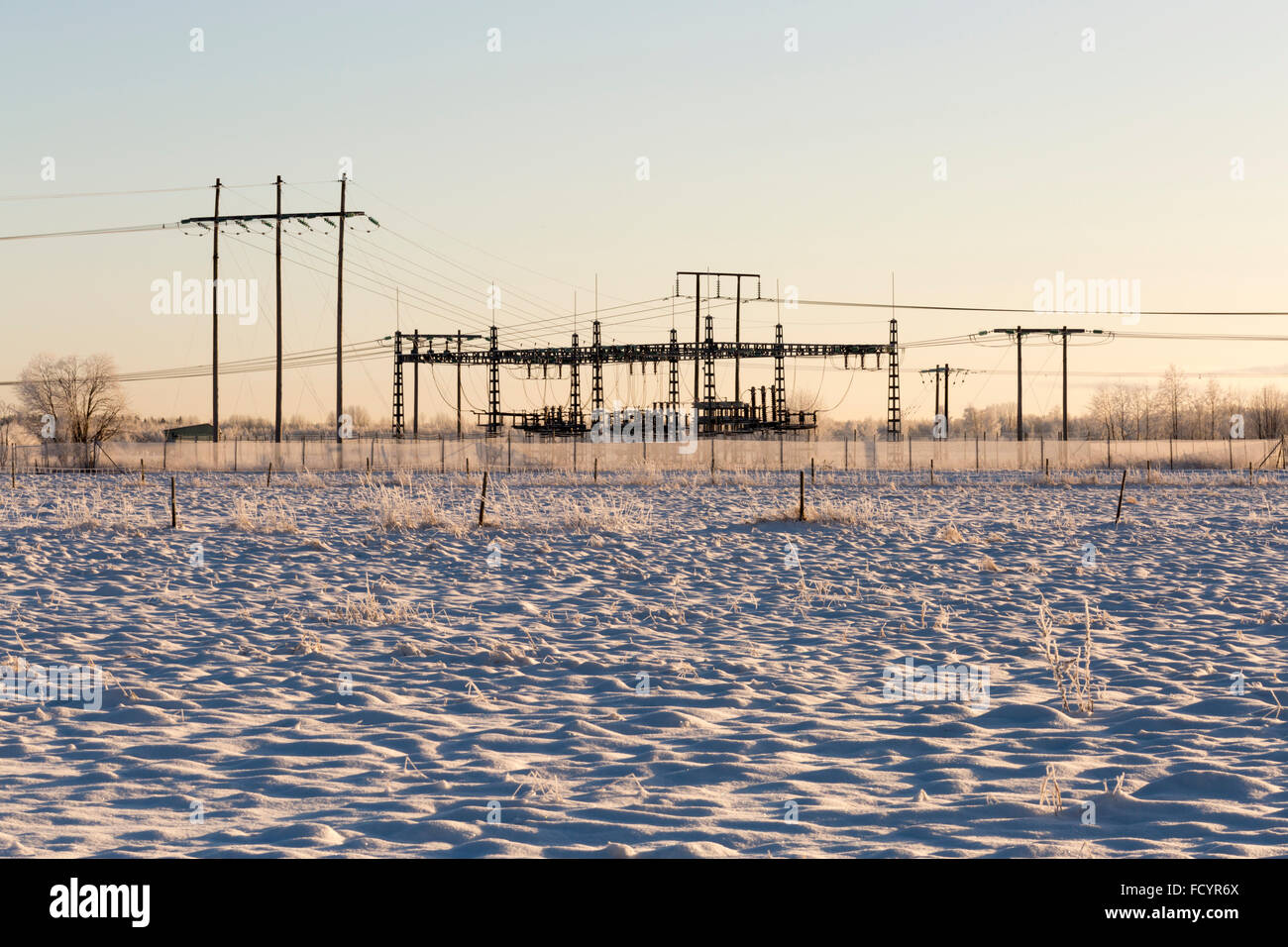 Electricity pylon in snow hi-res stock photography and images - Alamy