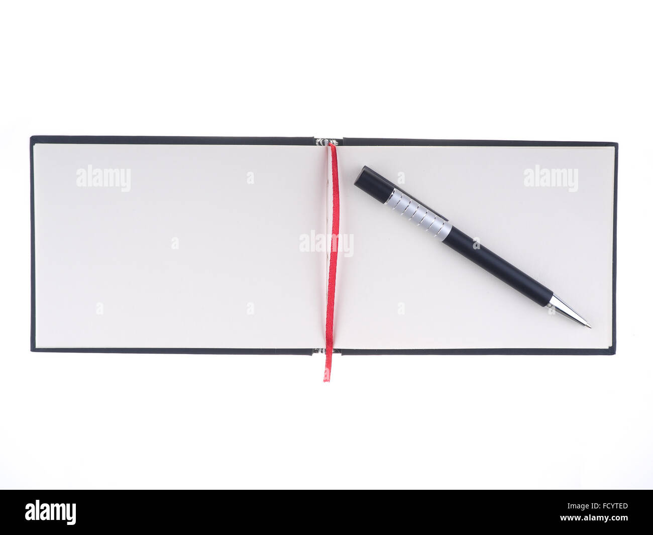 notebook with a pen on a white background Stock Photo - Alamy