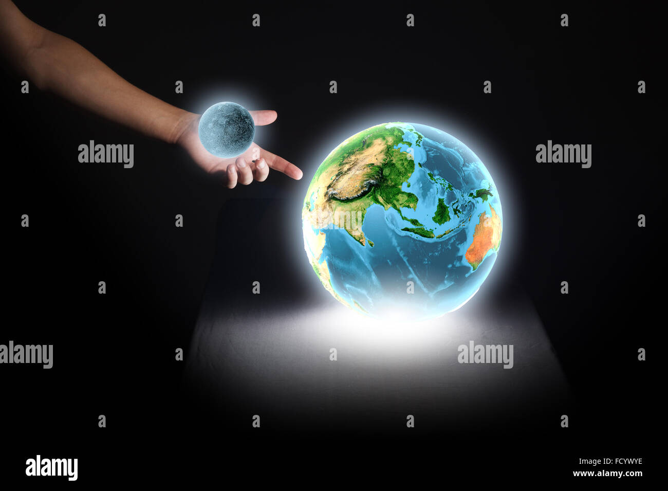 Close up of human hand touching Earth planet with finger. Elements of ...