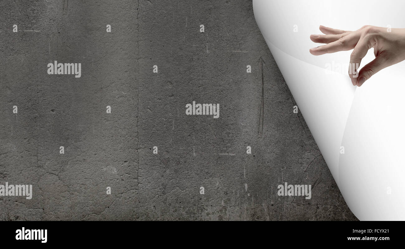 Close up of hand pulling paper list Stock Photo - Alamy