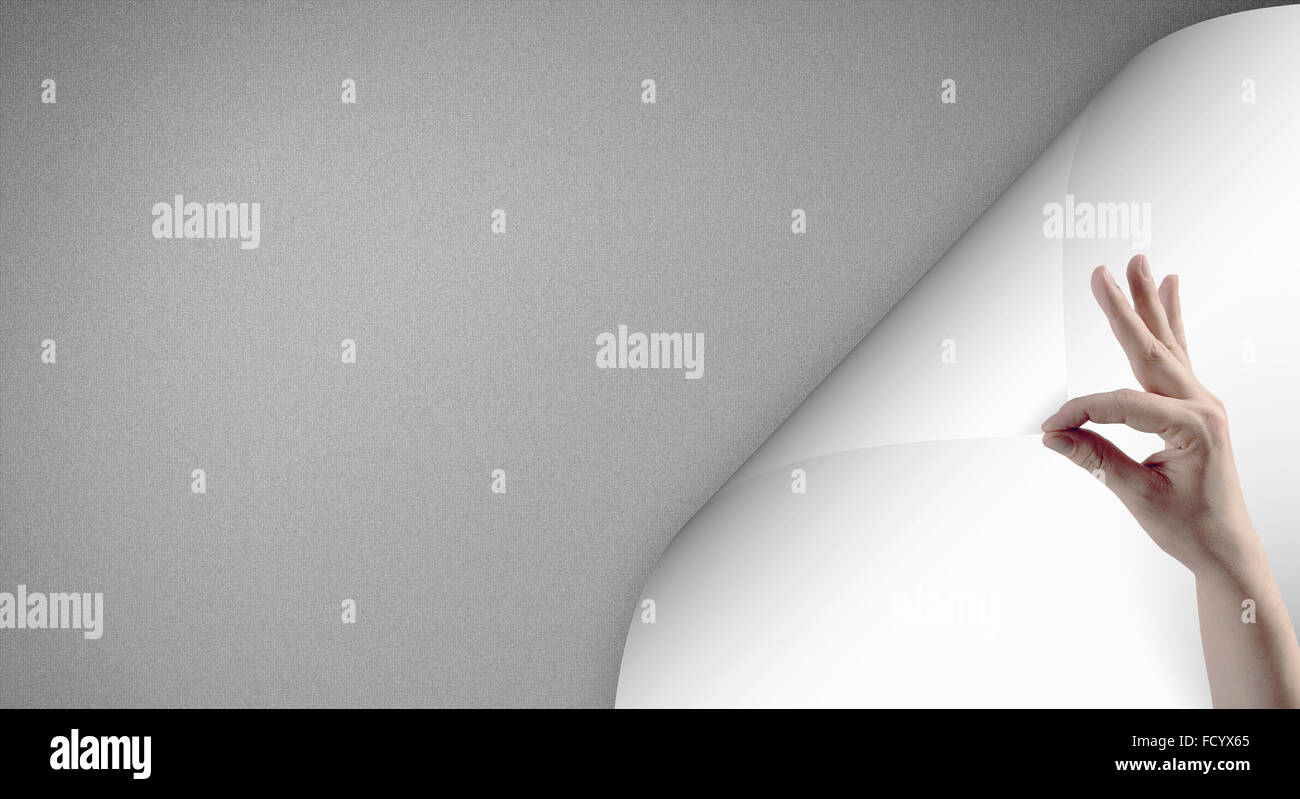 Hand pulling paper hi-res stock photography and images - Alamy