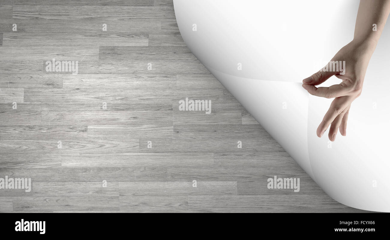 Close up of hand pulling paper list Stock Photo - Alamy