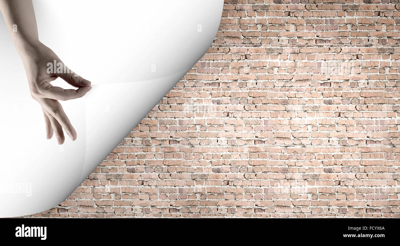 Close up of hand pulling paper list Stock Photo - Alamy