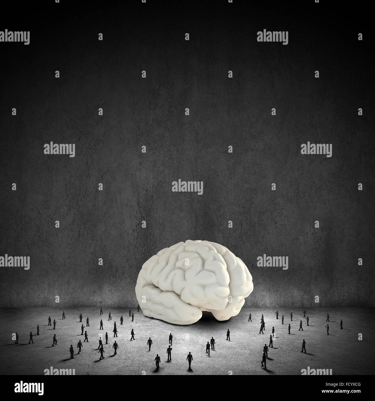 Huge human brain and many little businesspeople around Stock Photo - Alamy