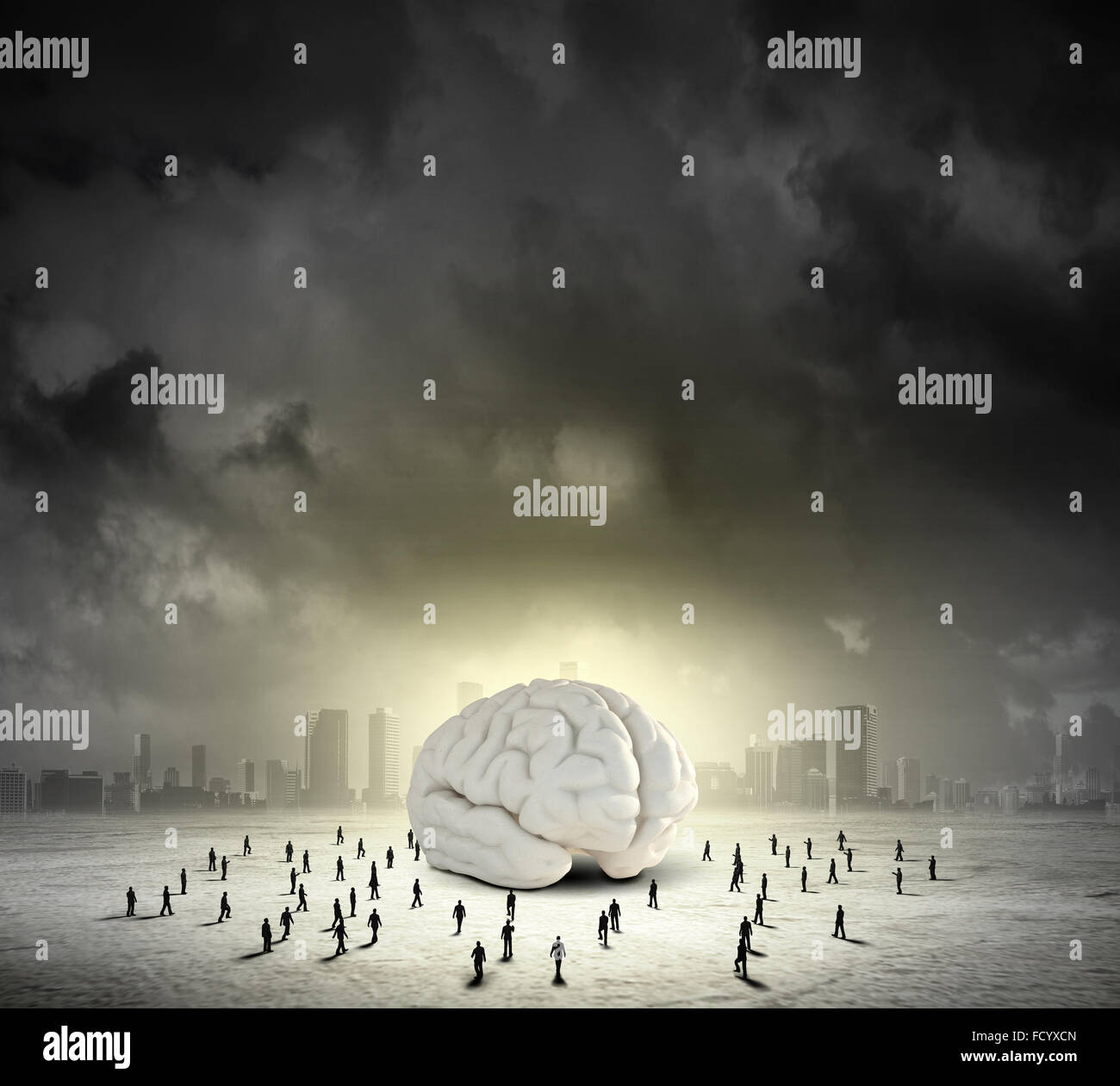 Huge human brain and many little businesspeople around Stock Photo - Alamy