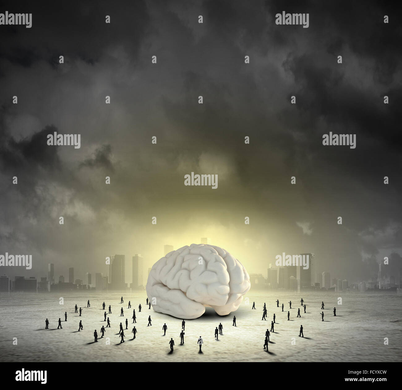 Huge human brain and many little businesspeople around Stock Photo - Alamy
