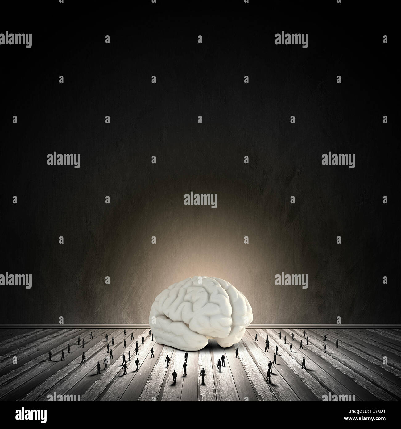 Huge human brain and many little businesspeople around Stock Photo - Alamy