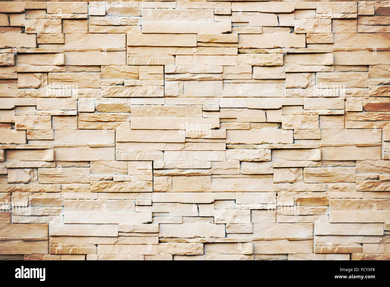 Pattern from lite brown decorative slate stone wall surface. For use as ...