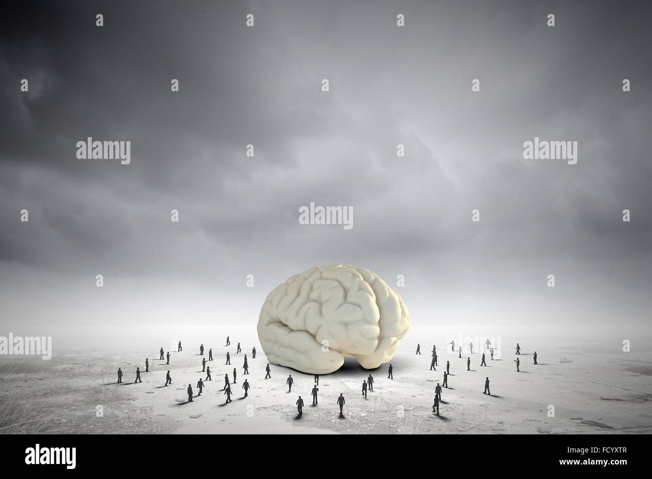 Huge human brain and many little businesspeople around Stock Photo - Alamy