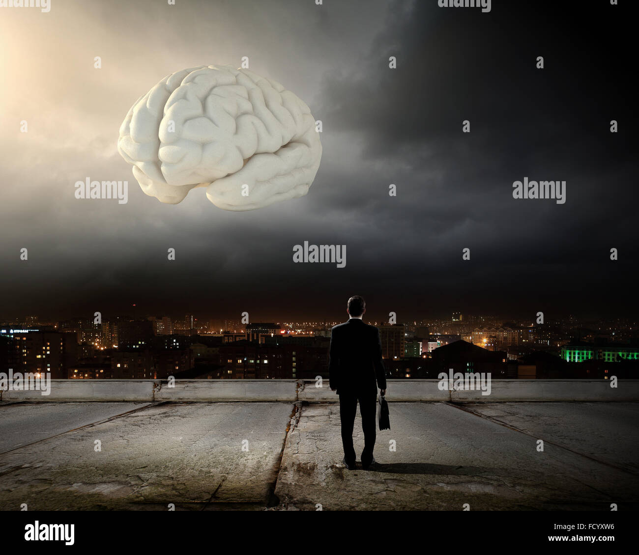 Rear view of businessman looking at big brain model Stock Photo - Alamy