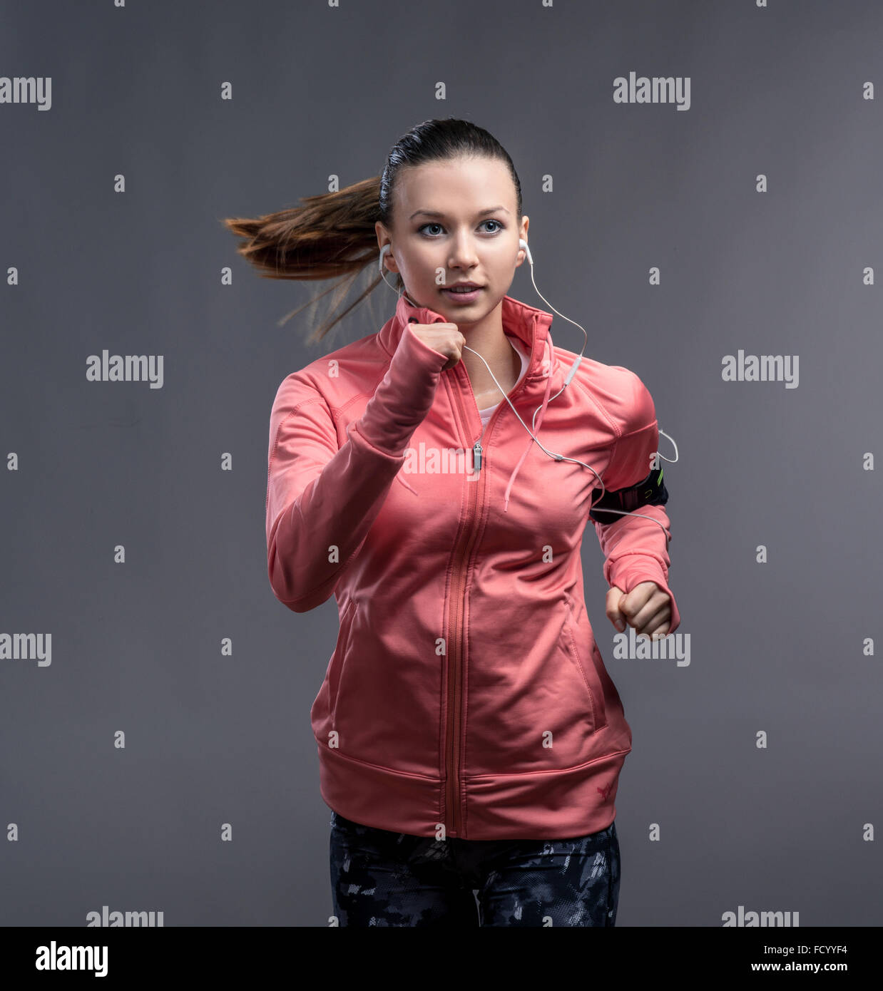 Beautiful young runner Stock Photo - Alamy