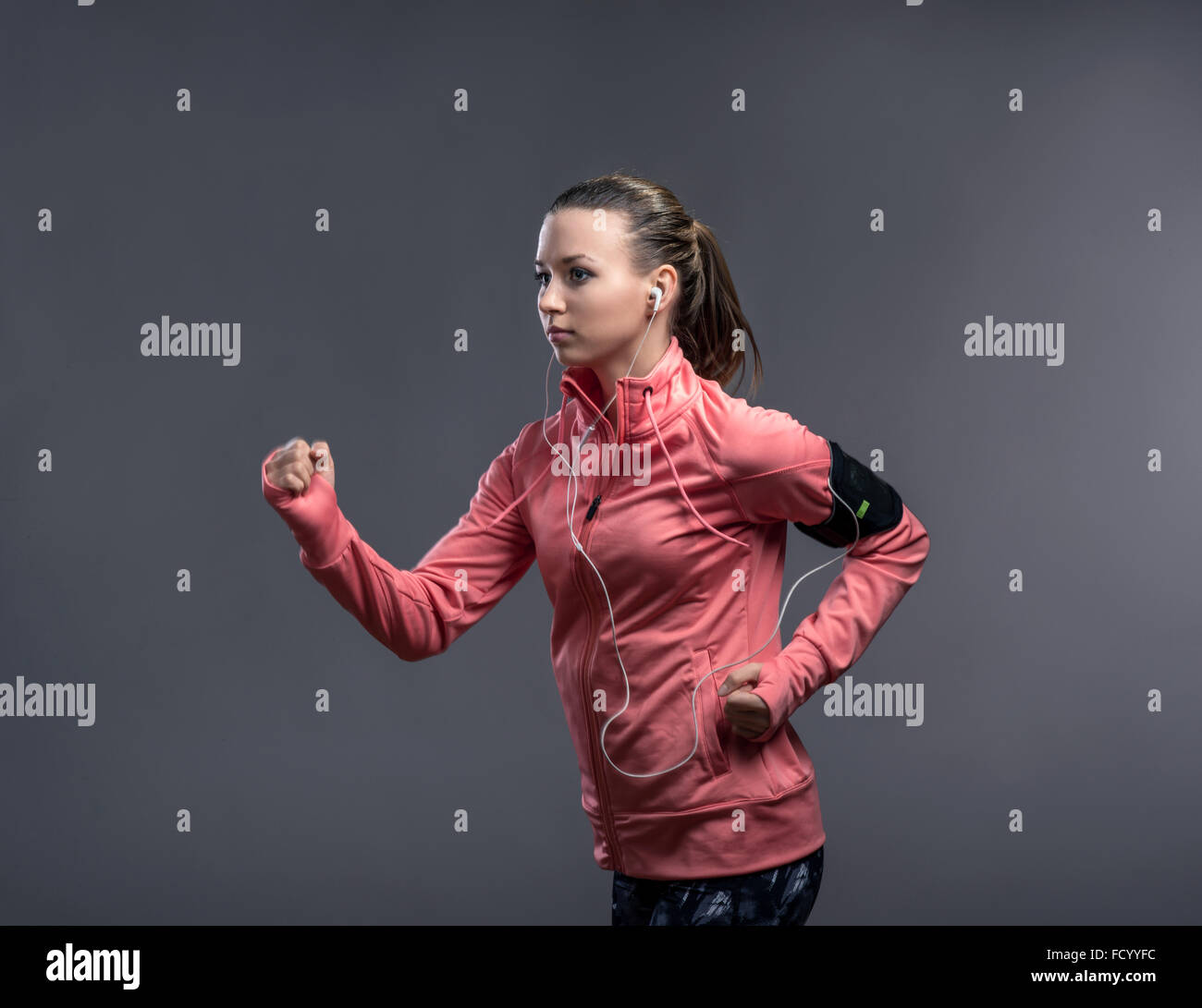 Beautiful young runner Stock Photo - Alamy